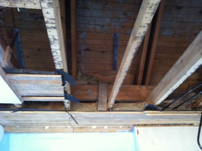 Replacement of load-bearing wooden beam with steel beam. Durability and ...